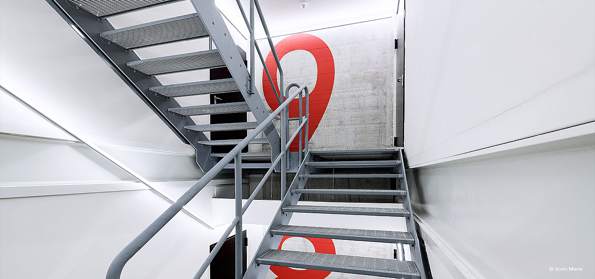 Office lighting with slim black luminaires by Luxsystem