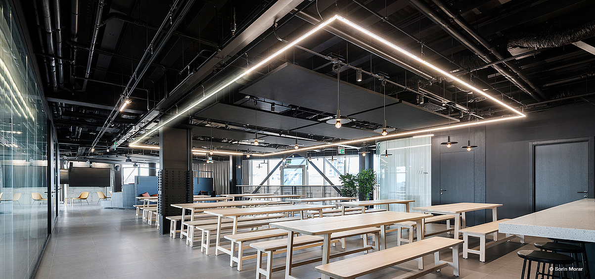 Office lighting with slim black luminaires by Luxsystem